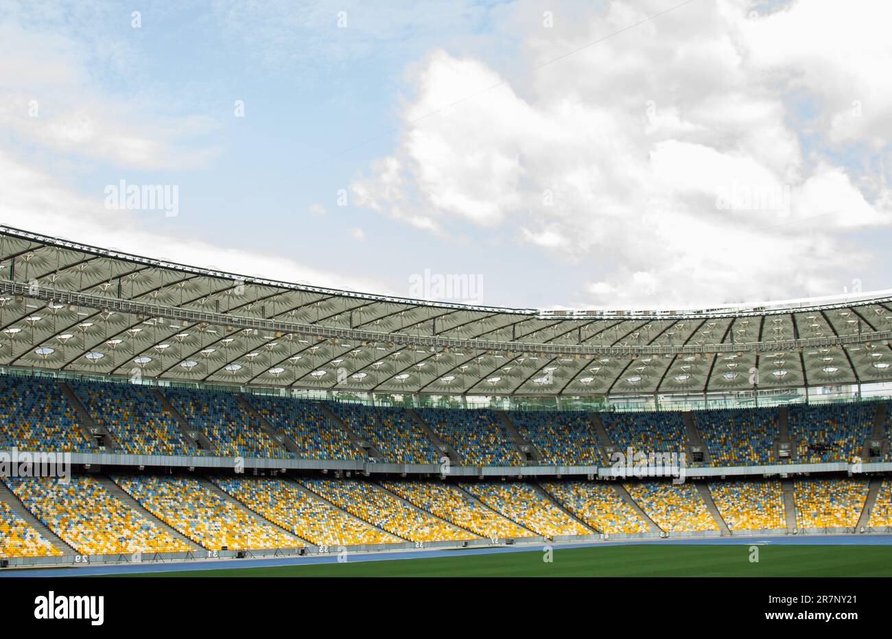 soccer stadium inside view. football field, empty stands, a crowd of ...