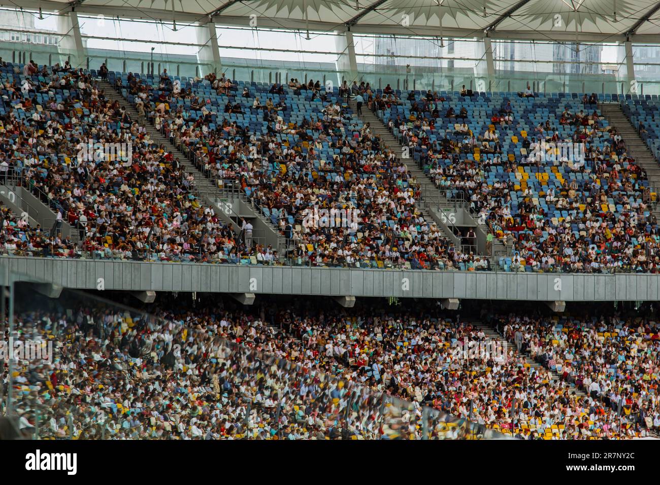 soccer stadium inside view. football field, empty stands, a crowd of ...