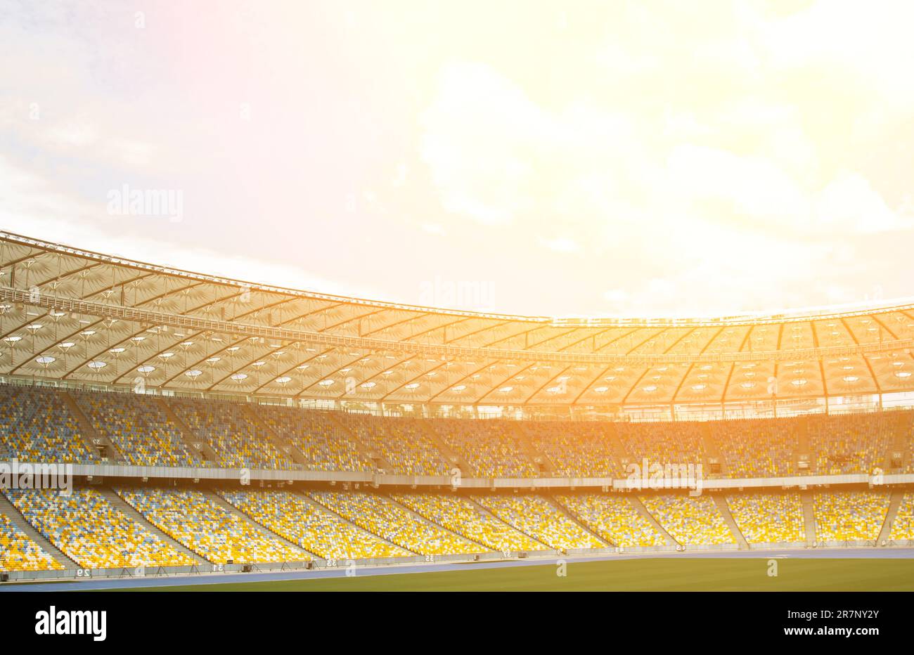 soccer stadium inside view. football field, empty stands, a crowd of ...