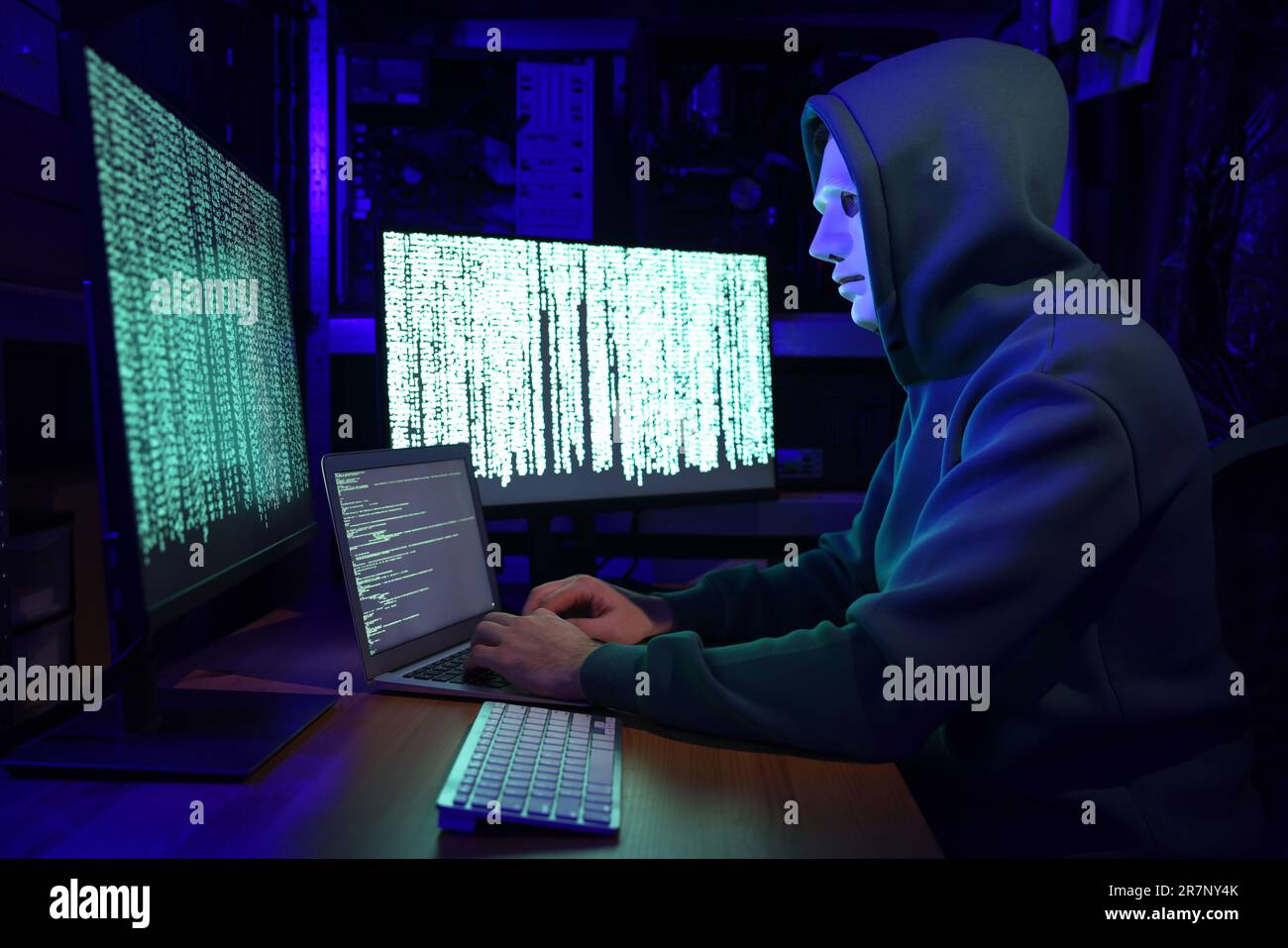Hacker in mask working with computers in dark room. Cyber attack Stock Photo - Alamy