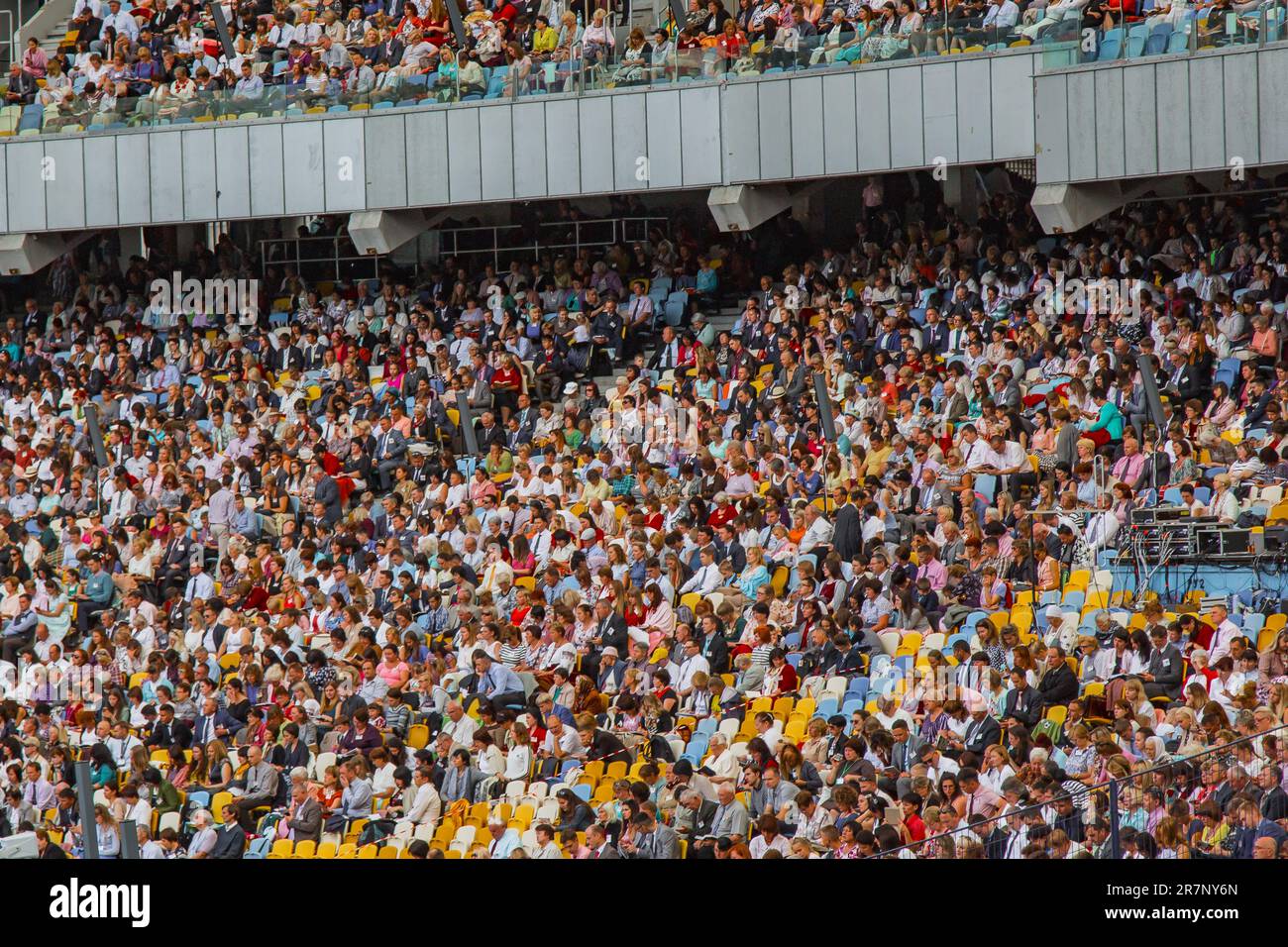 soccer stadium inside view. football field, empty stands, a crowd of ...