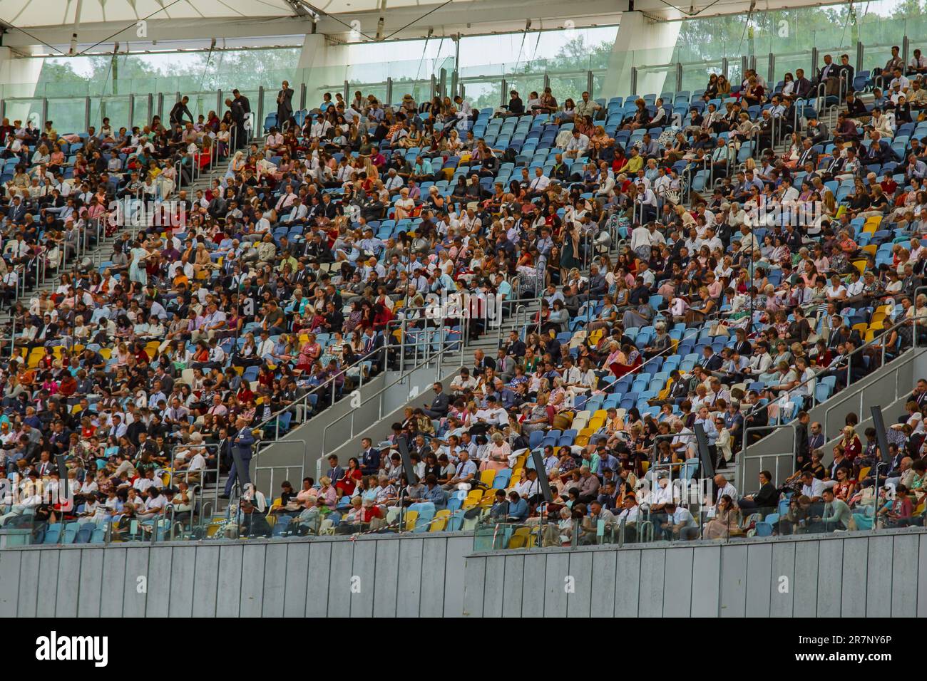 soccer stadium inside view. football field, empty stands, a crowd of ...