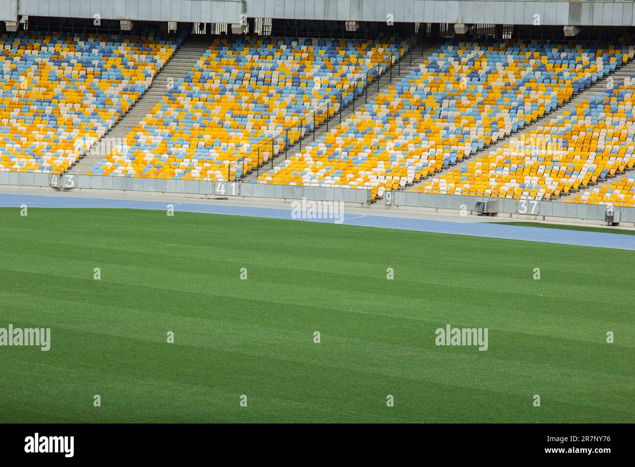 soccer stadium inside view. football field, empty stands, a crowd of ...