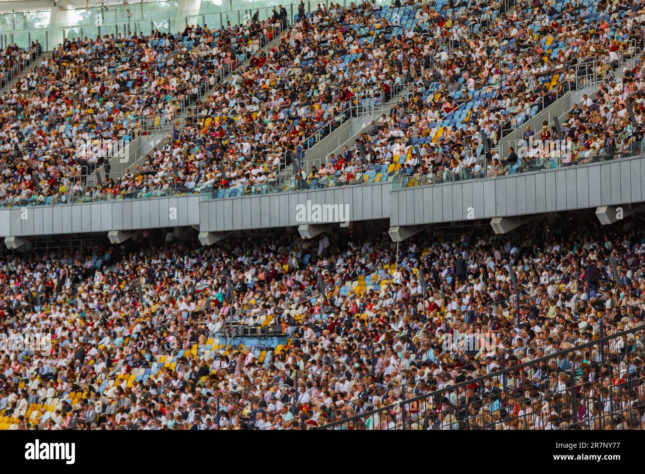 soccer stadium inside view. football field, empty stands, a crowd of ...