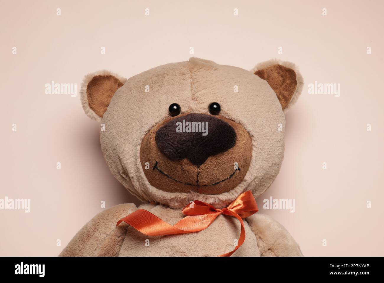 Cute teddy bear on beige background, top view Stock Photo - Alamy