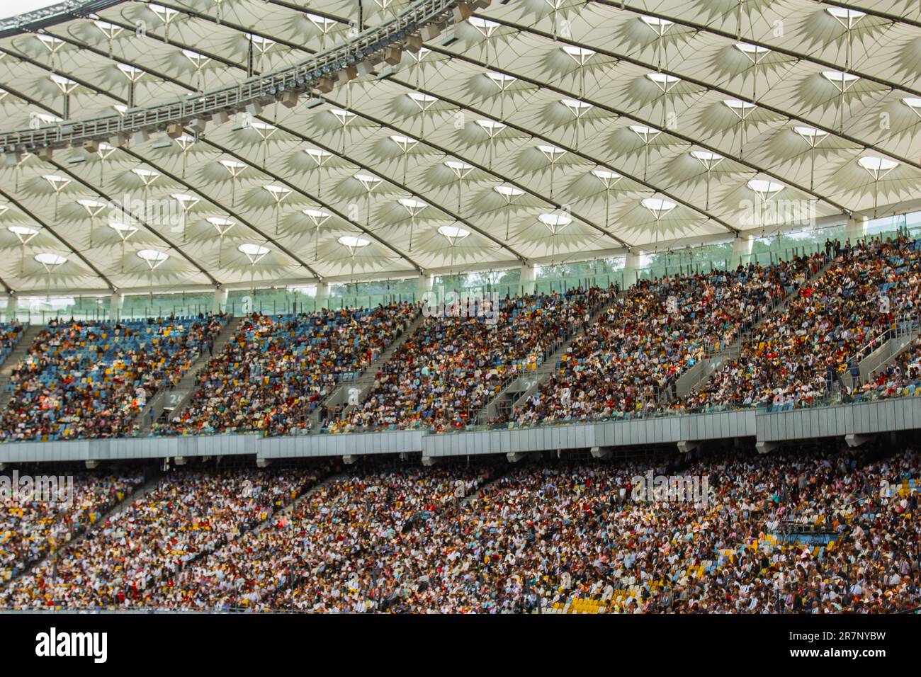 soccer stadium inside view. football field, empty stands, a crowd of ...