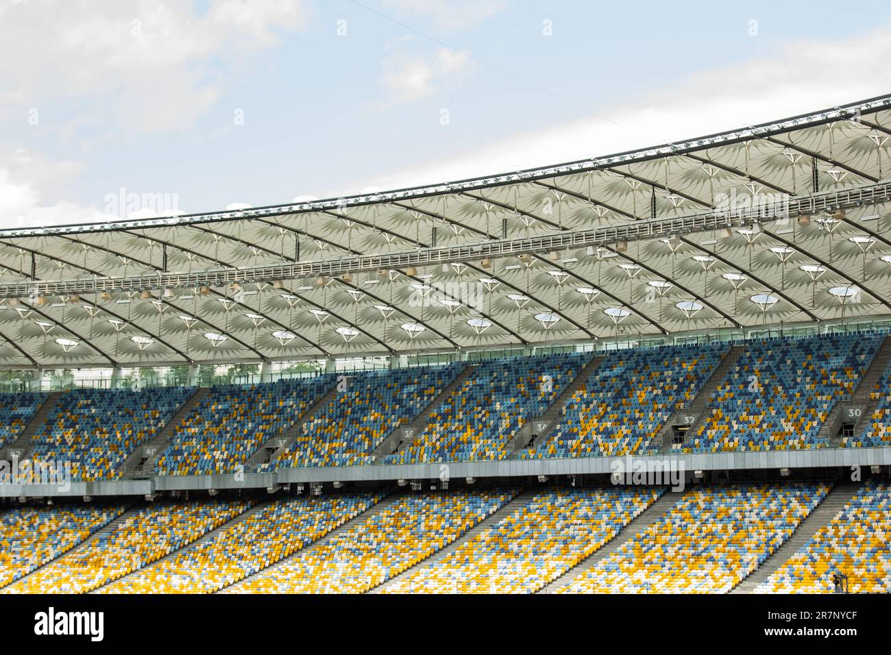 soccer stadium inside view. football field, empty stands, a crowd of ...