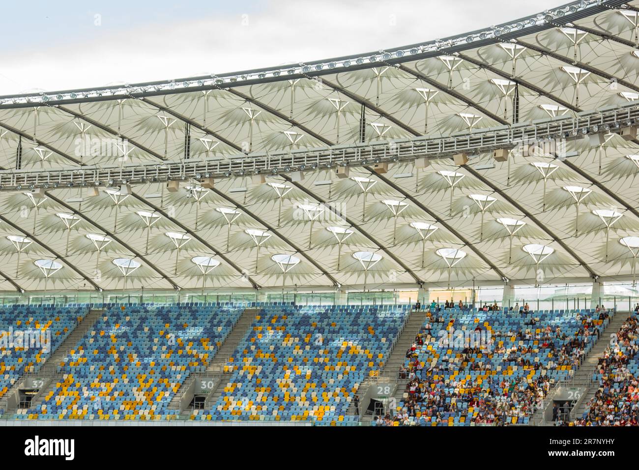 soccer stadium inside view. football field, empty stands, a crowd of ...