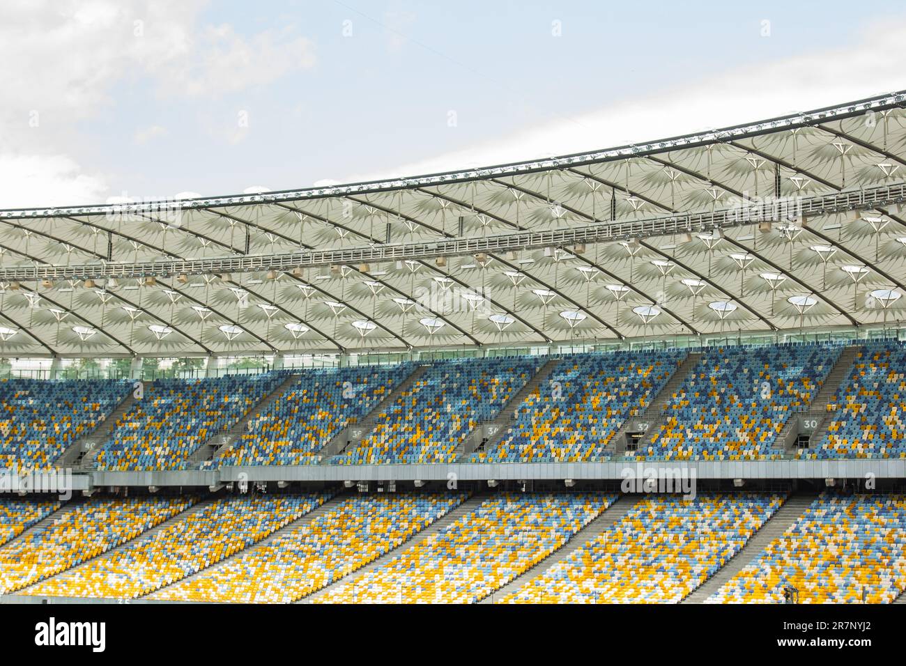 soccer stadium inside view. football field, empty stands, a crowd of ...