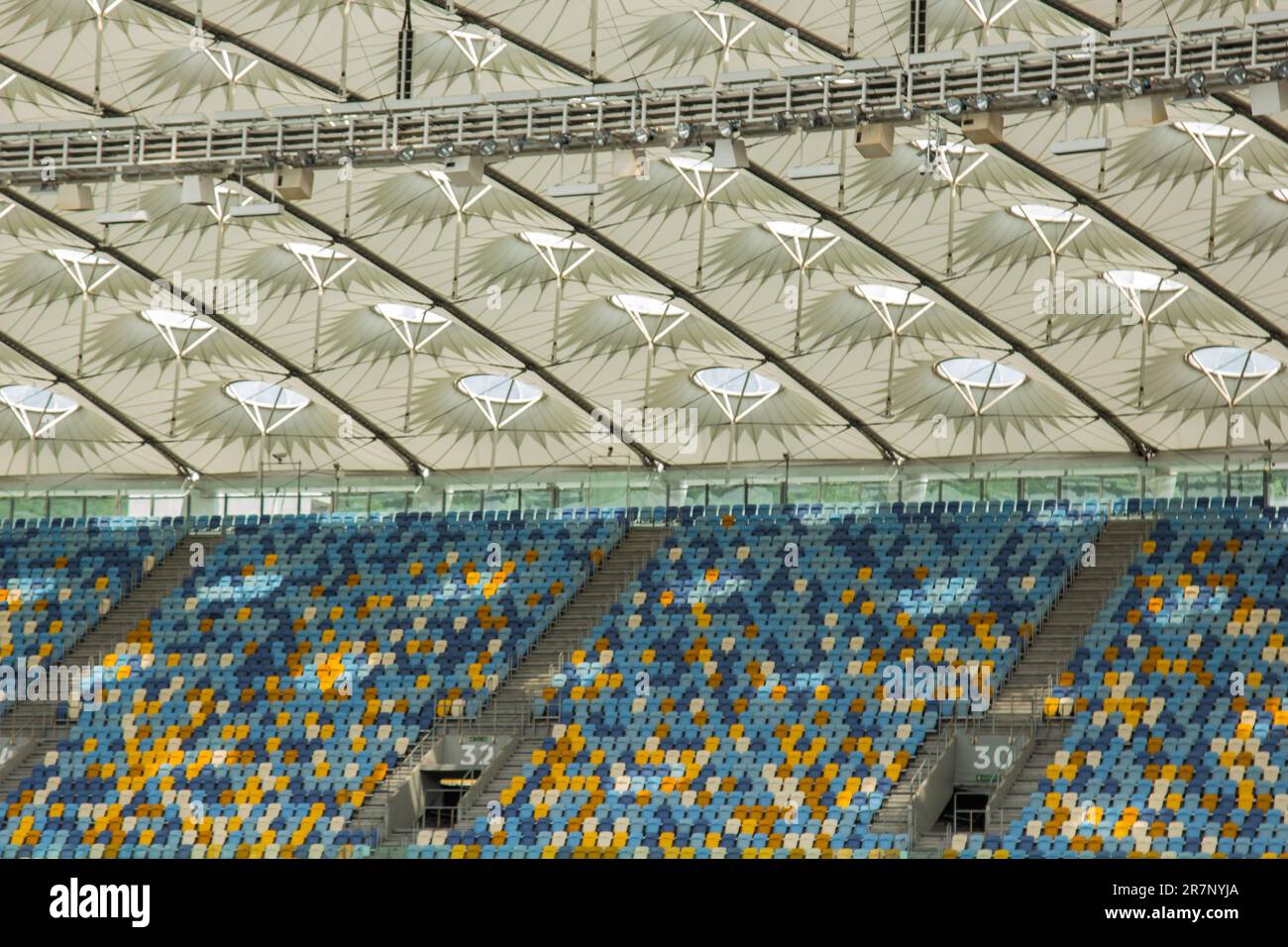 soccer stadium inside view. football field, empty stands, a crowd of ...