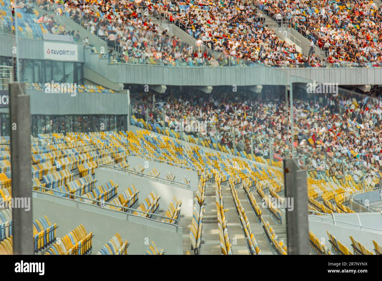 soccer stadium inside view. football field, empty stands, a crowd of ...
