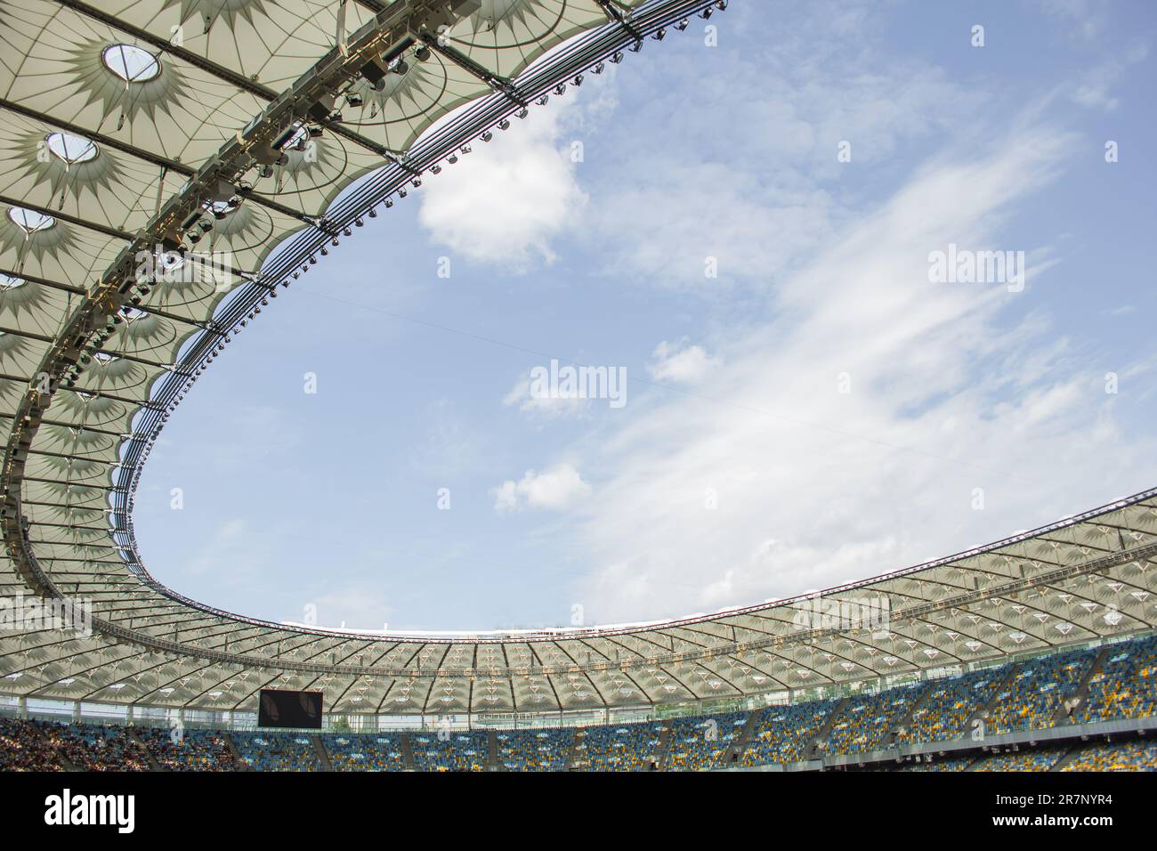 soccer stadium inside view. football field, empty stands, a crowd of ...
