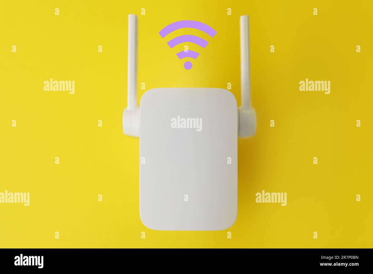 New modern repeater and Wi-Fi symbol on yellow background Stock Photo ...