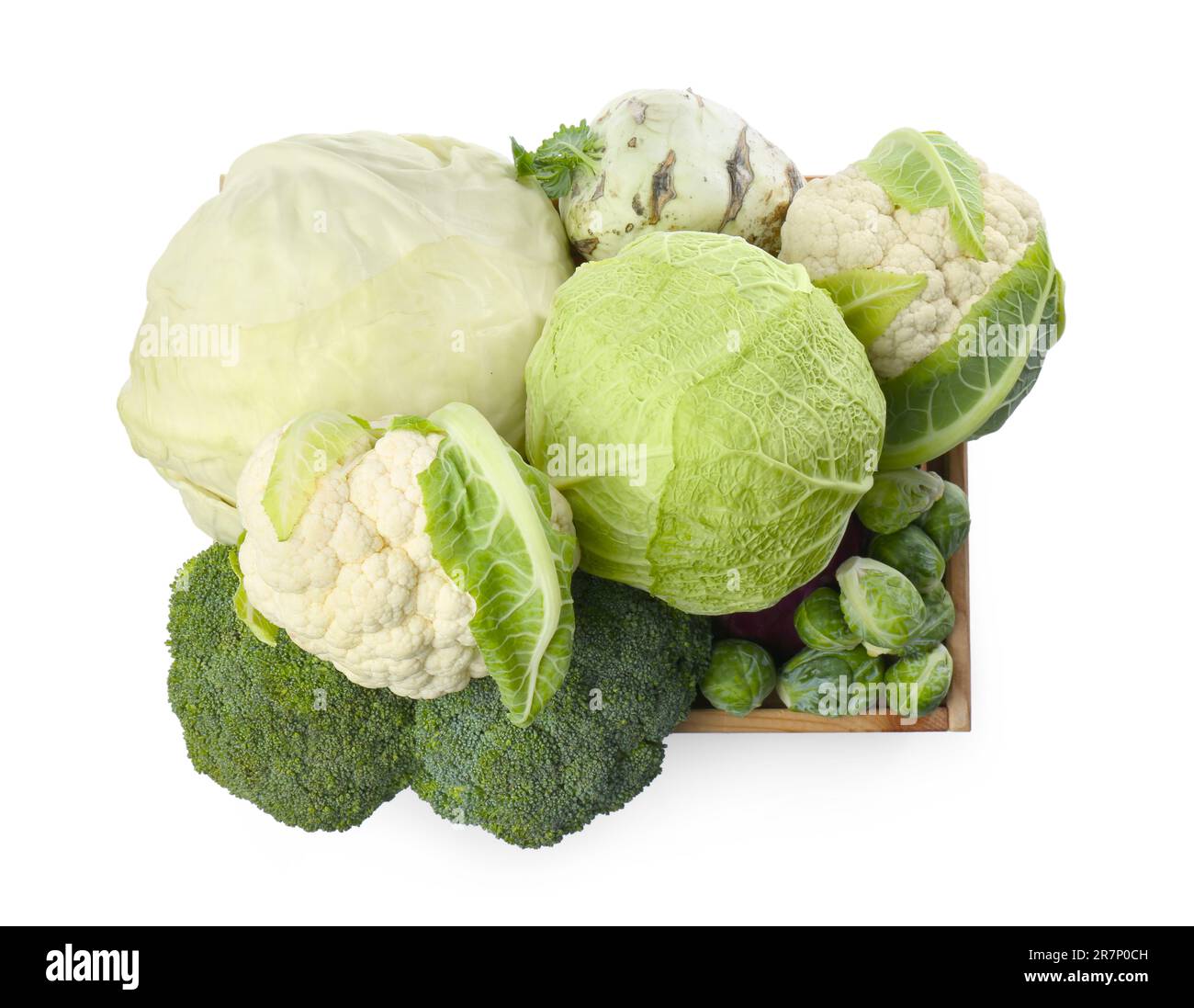 Wooden crate with different types of fresh cabbage on white background ...