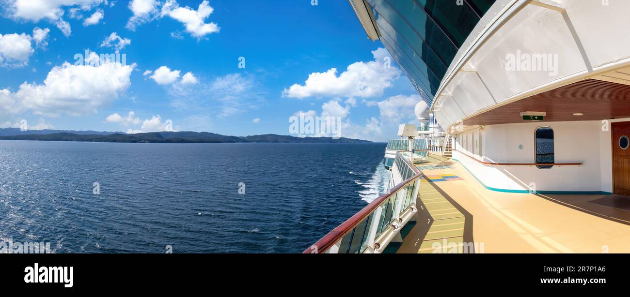 Panoramic ocean view with luxury cruise ship heading to vacation from ...
