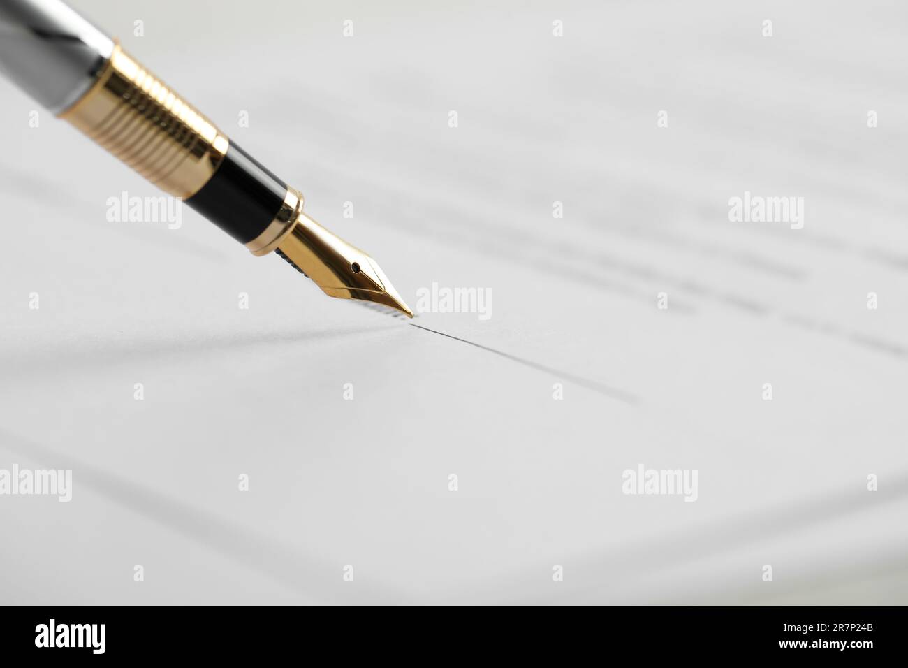 Signing document with fountain pen, closeup. Notary services Stock ...