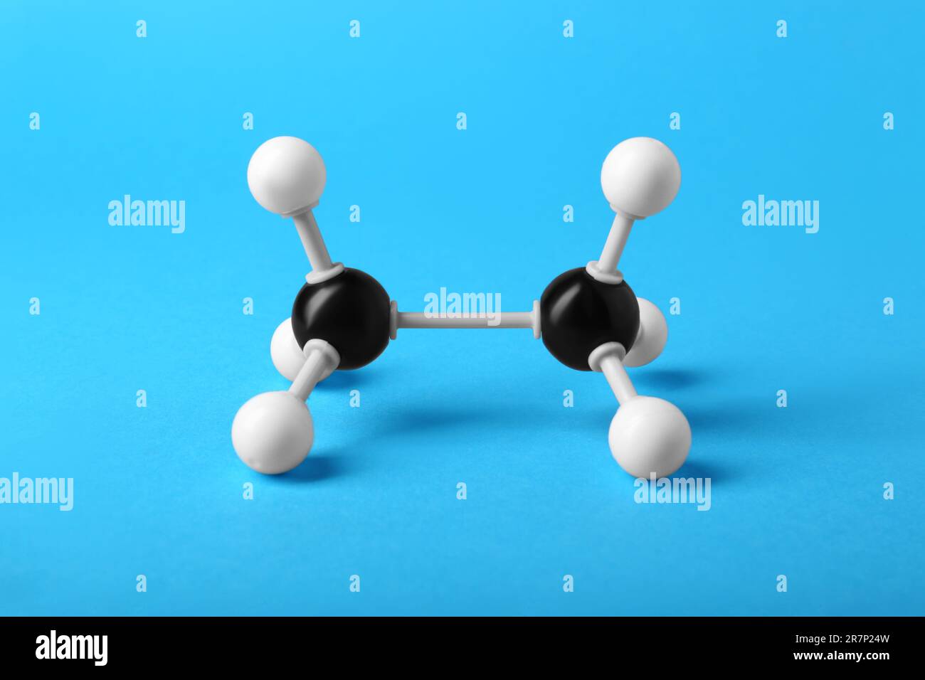 Molecule of alcohol on light blue background. Chemical model Stock ...