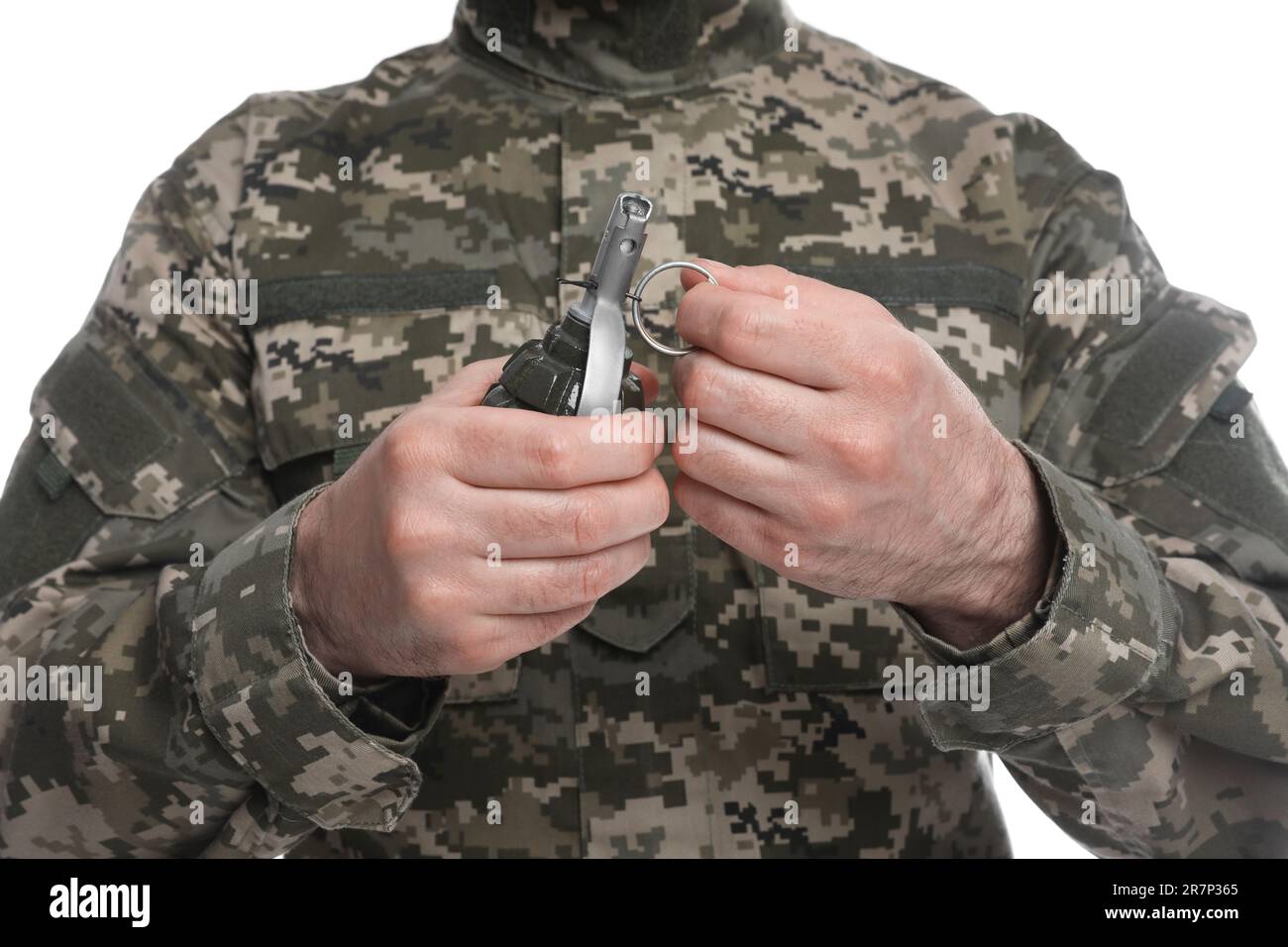Soldier pulling safety pin out of hand grenade on white background ...