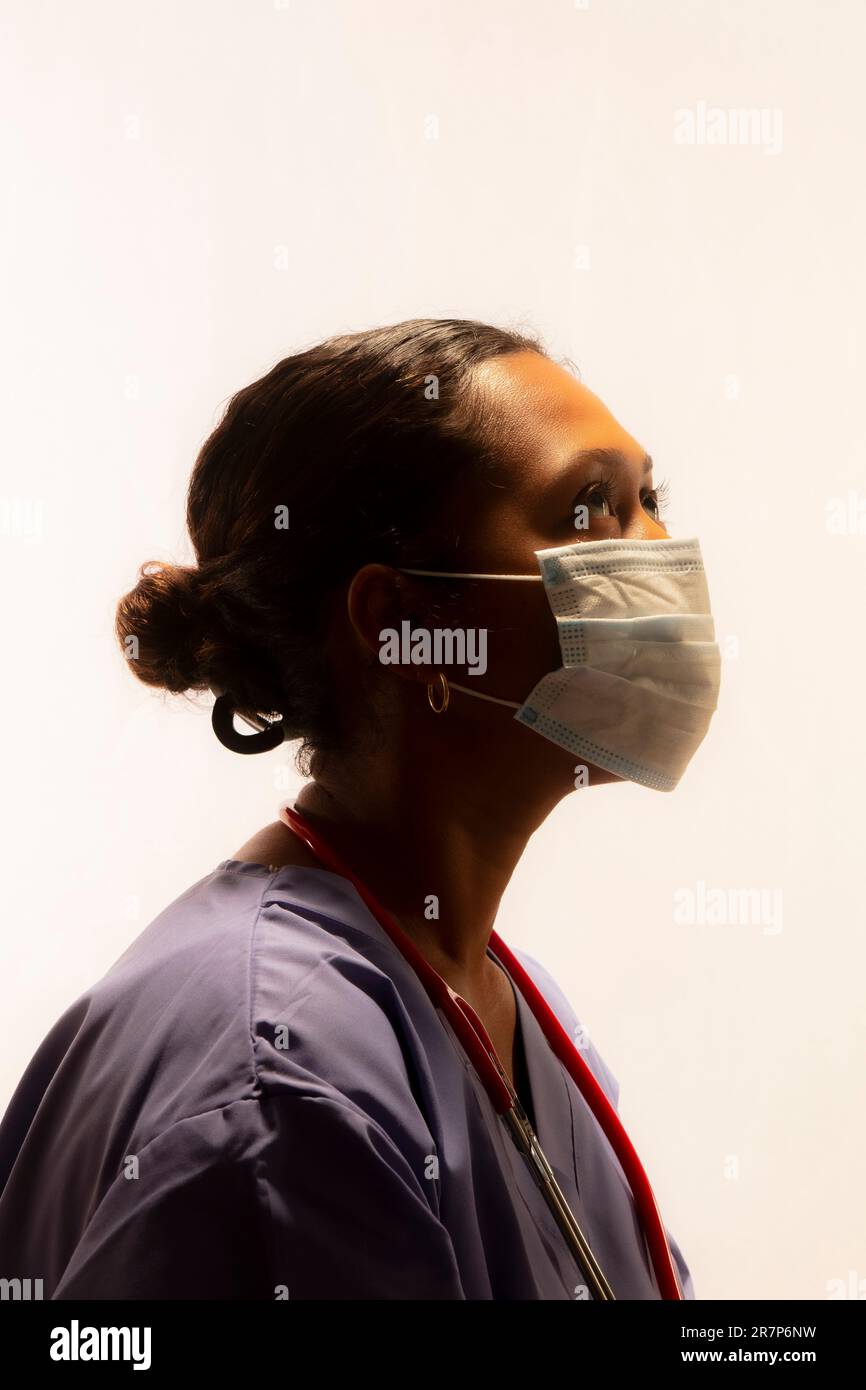 Healthcare professional wearing face mask Stock Photo - Alamy