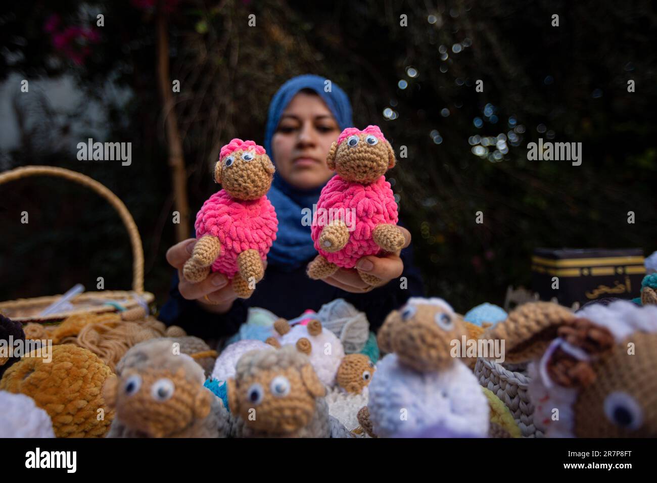 Gaza, Palestine. 15th June, 2023. Palestinian Reham Shurrab holds dolls ...