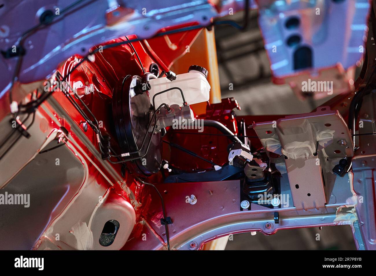 Open car bay with vacuum assisted brakes and engine at plant Stock ...