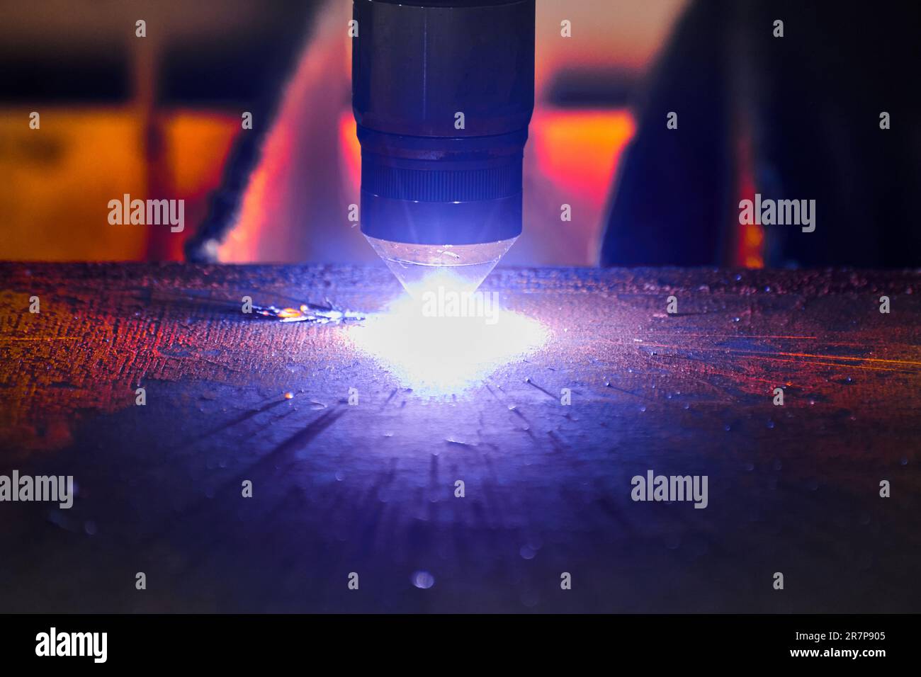 Process of plasma cutting machine tool operation in workshop Stock ...