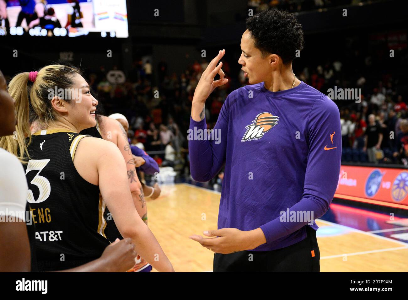 Phoenix Mercury center Brittney Griner, right, talks with Washington ...