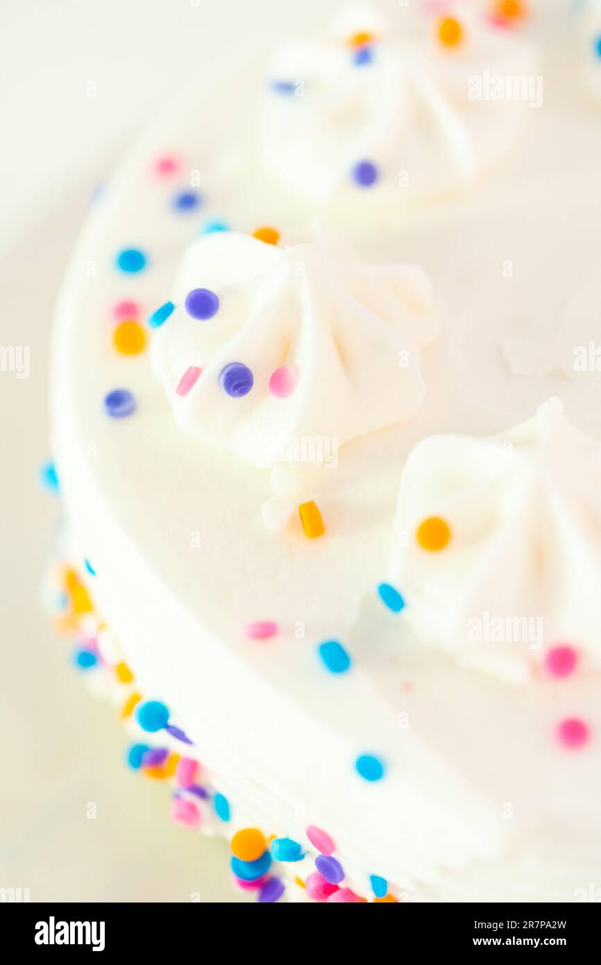 Birthday cake with funfetti sprinkles Stock Photo - Alamy
