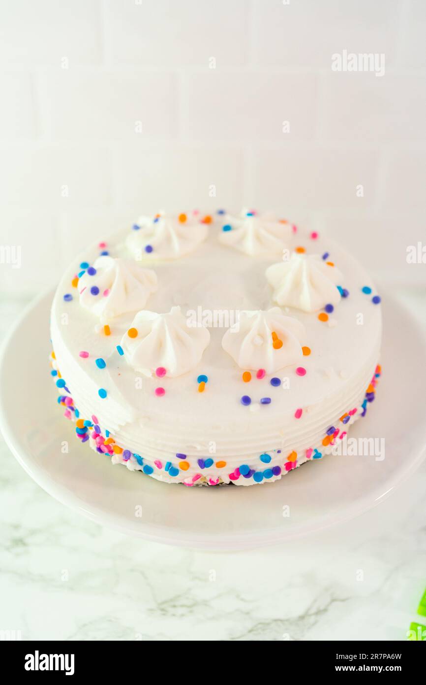 Birthday cake with funfetti sprinkles Stock Photo - Alamy