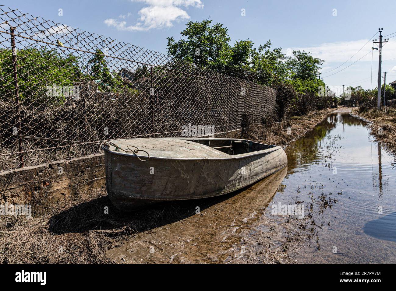 A boat seen in a former flooding area due to the Kakhovka breach in ...