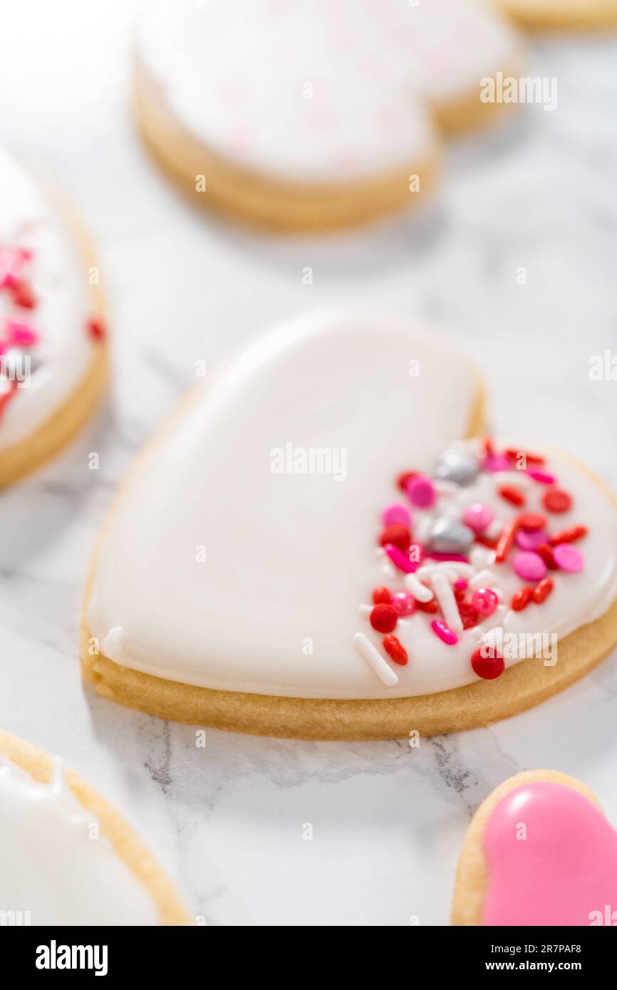Heart-shaped sugar cookies with royal icing Stock Photo - Alamy