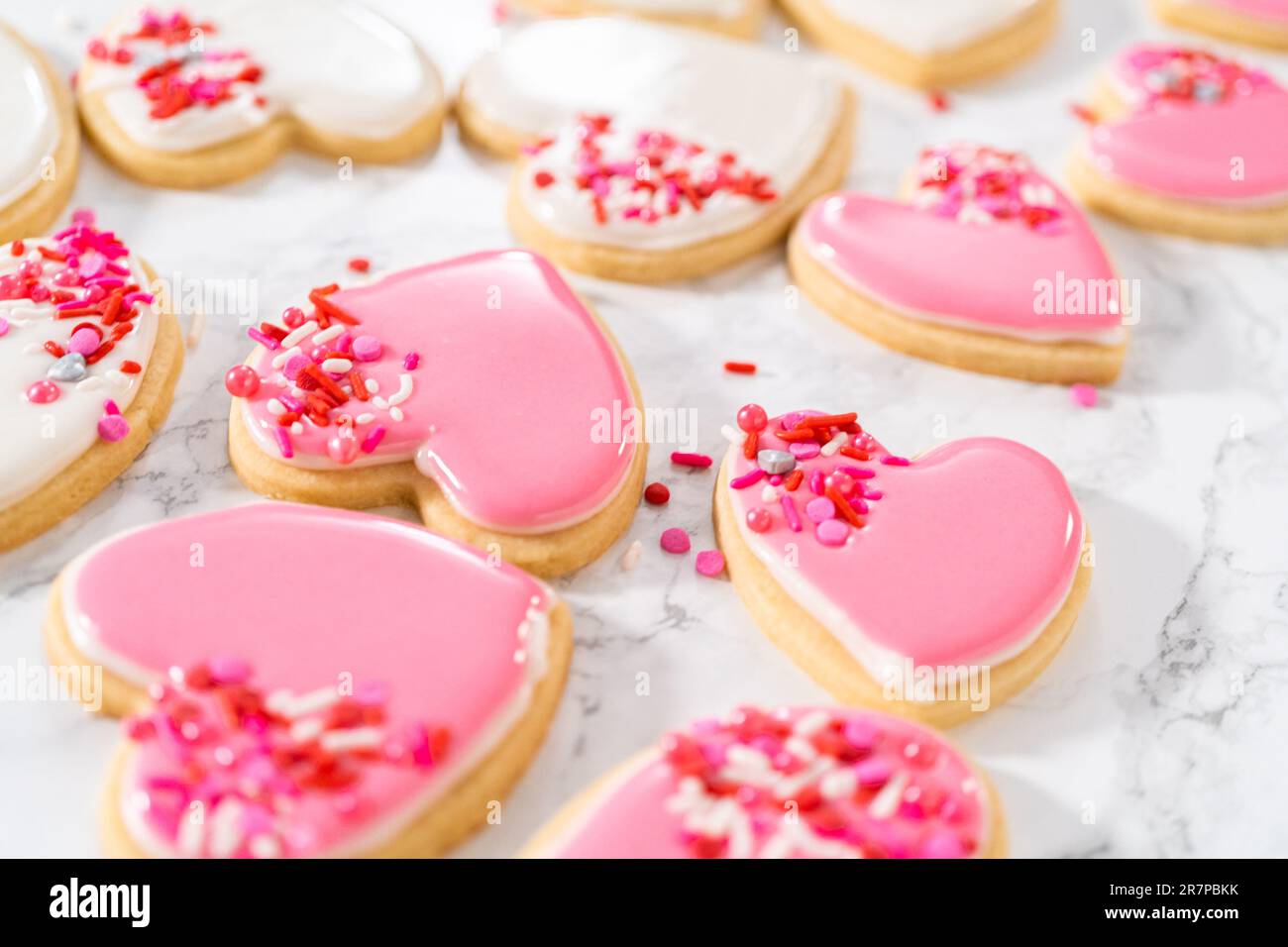 Heart-shaped sugar cookies with royal icing Stock Photo - Alamy