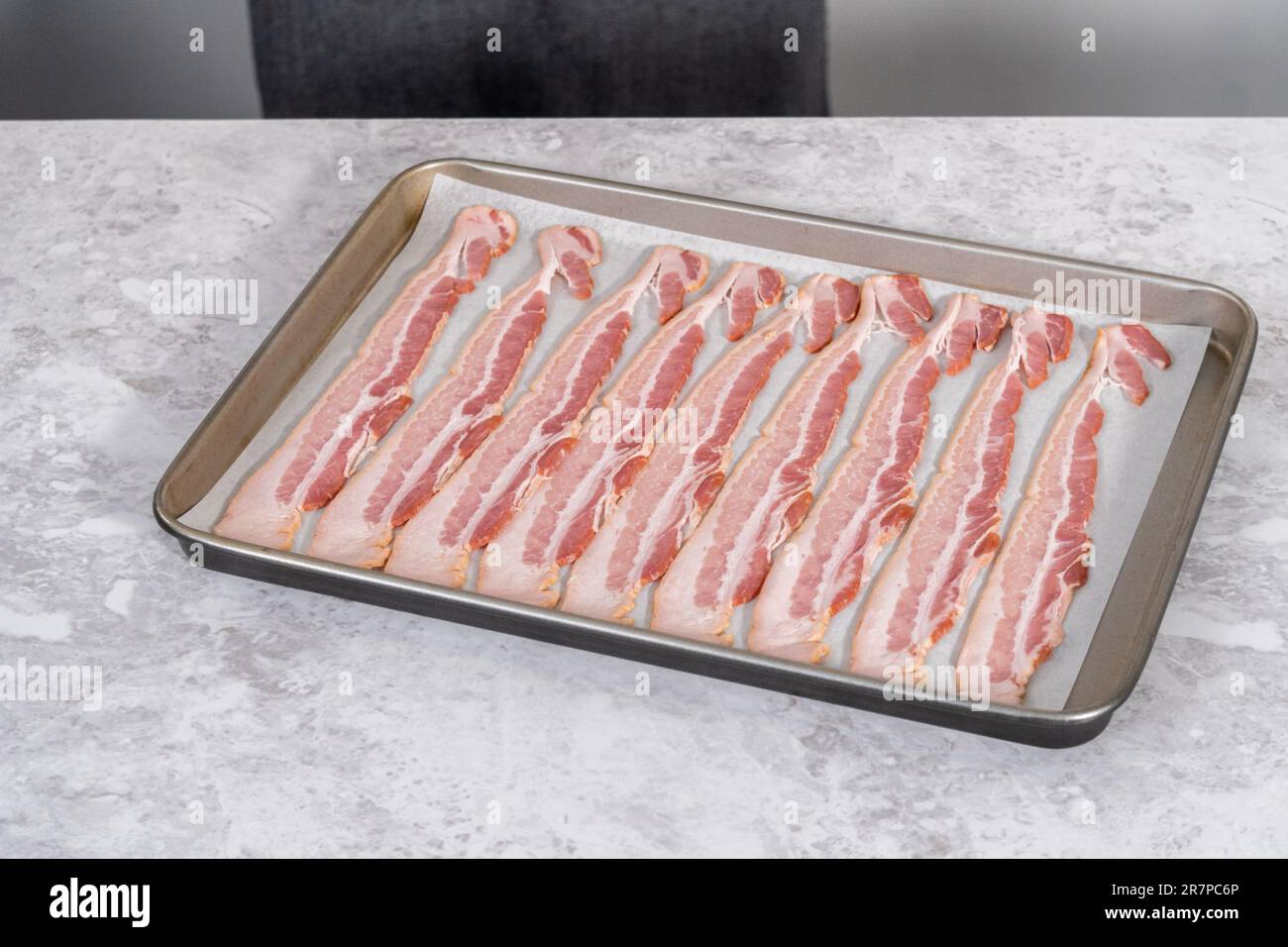 Cooking bacon strips Stock Photo - Alamy