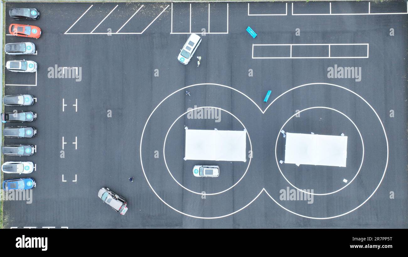 Vehicles take part in an automatic parking test at the Deqing ...