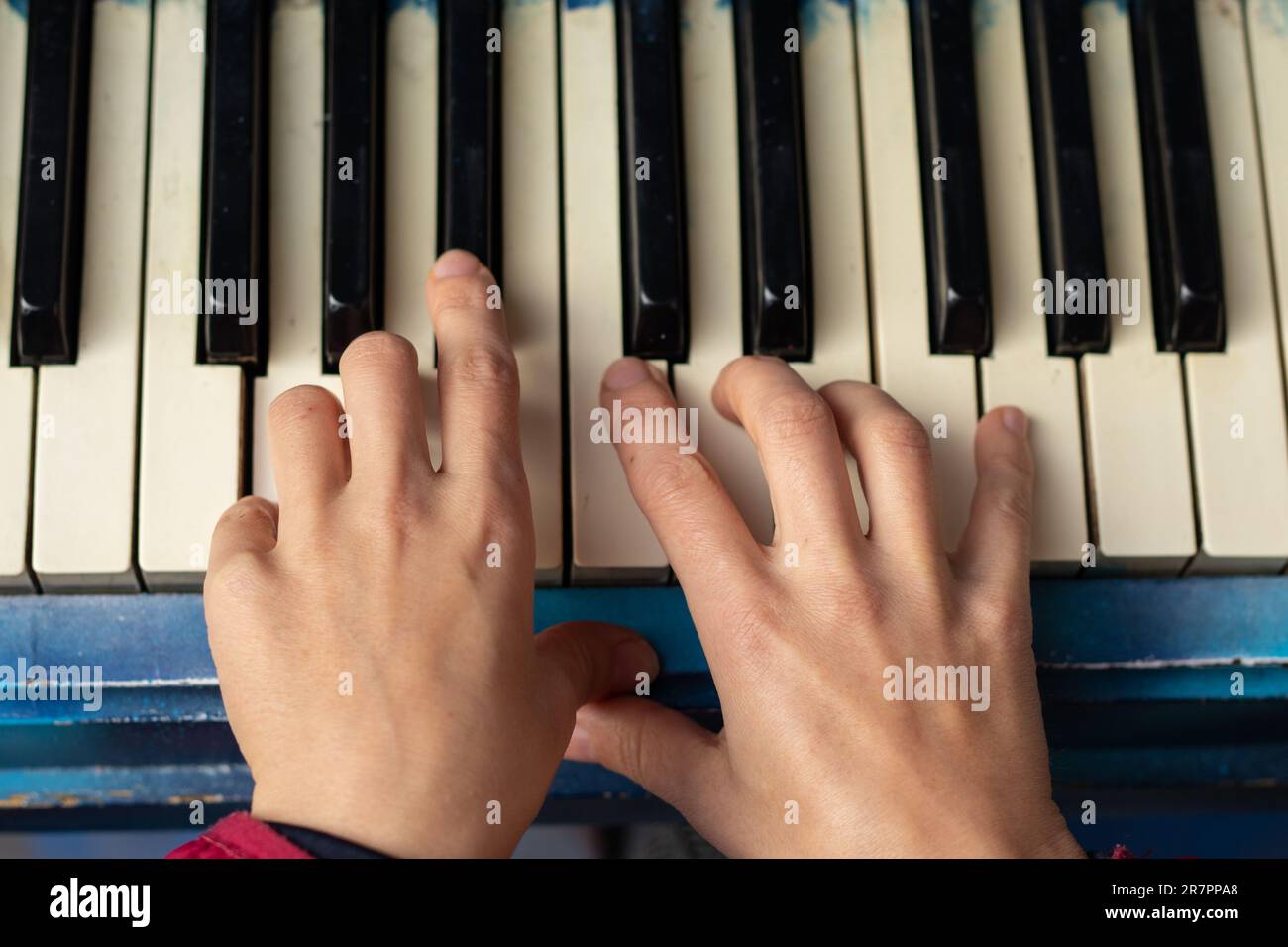 female hands on the piano close up, musical instrument Stock Photo - Alamy