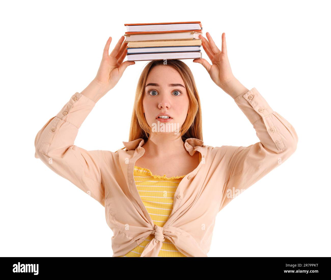 Woman balancing books head hi-res stock photography and images - Alamy