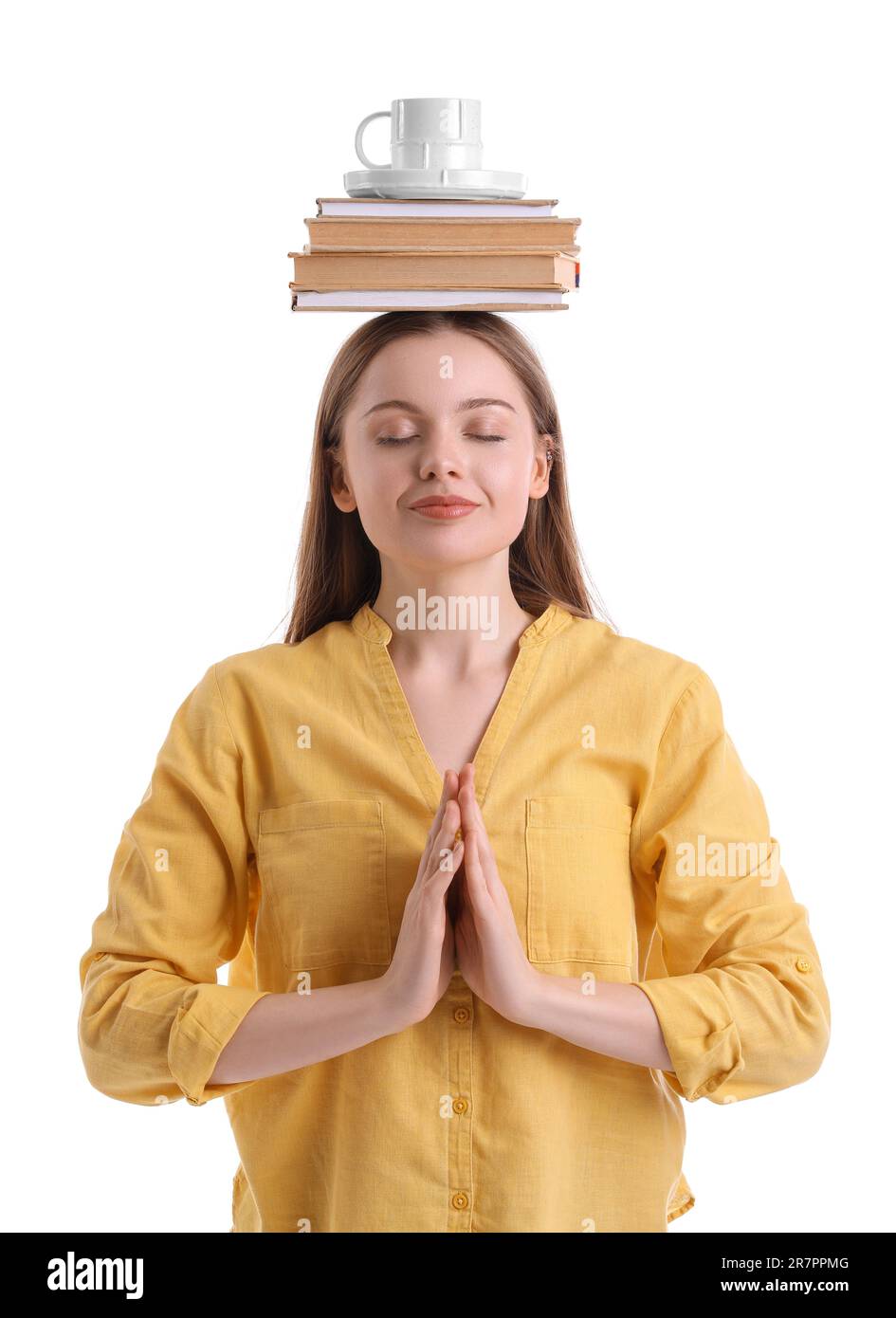 Woman balancing books head hi-res stock photography and images - Alamy