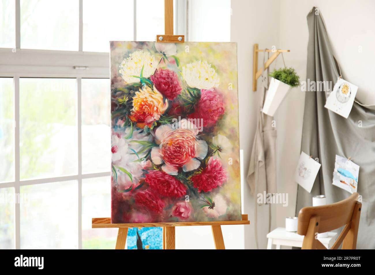 Drawing easel with beautiful picture in artist's workshop Stock Photo ...