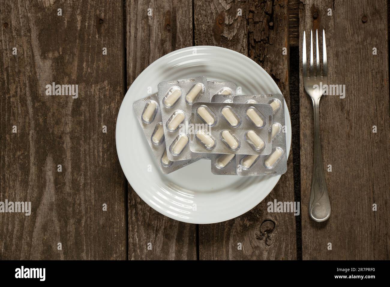 Tablets in a plate hi-res stock photography and images - Alamy