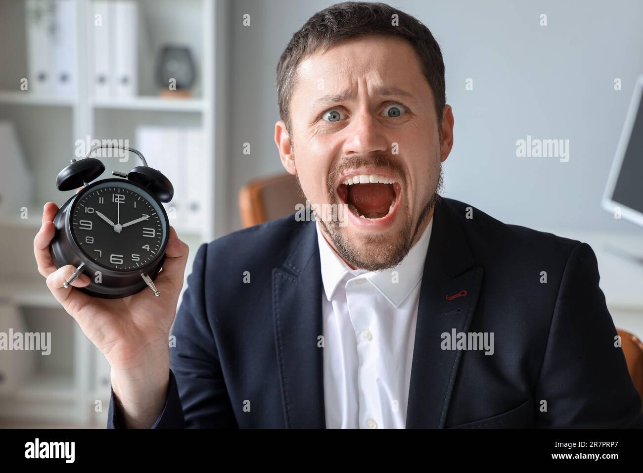 Man screaming alarm clock hi-res stock photography and images - Alamy