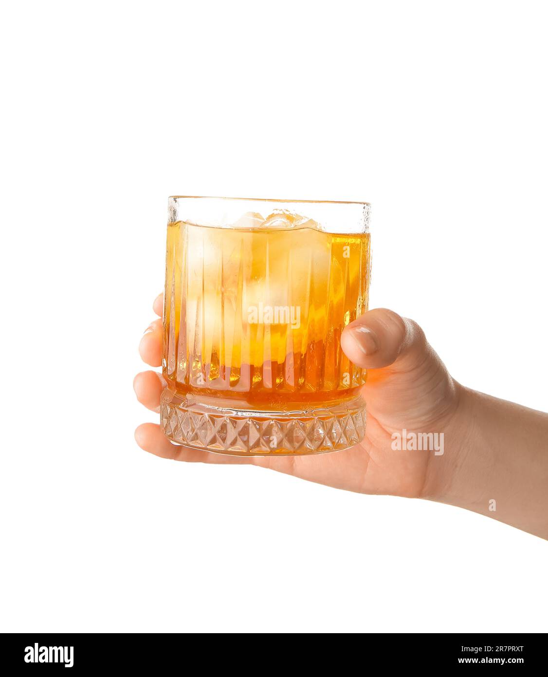 Female hand holding glass of ice tea with orange on white background ...