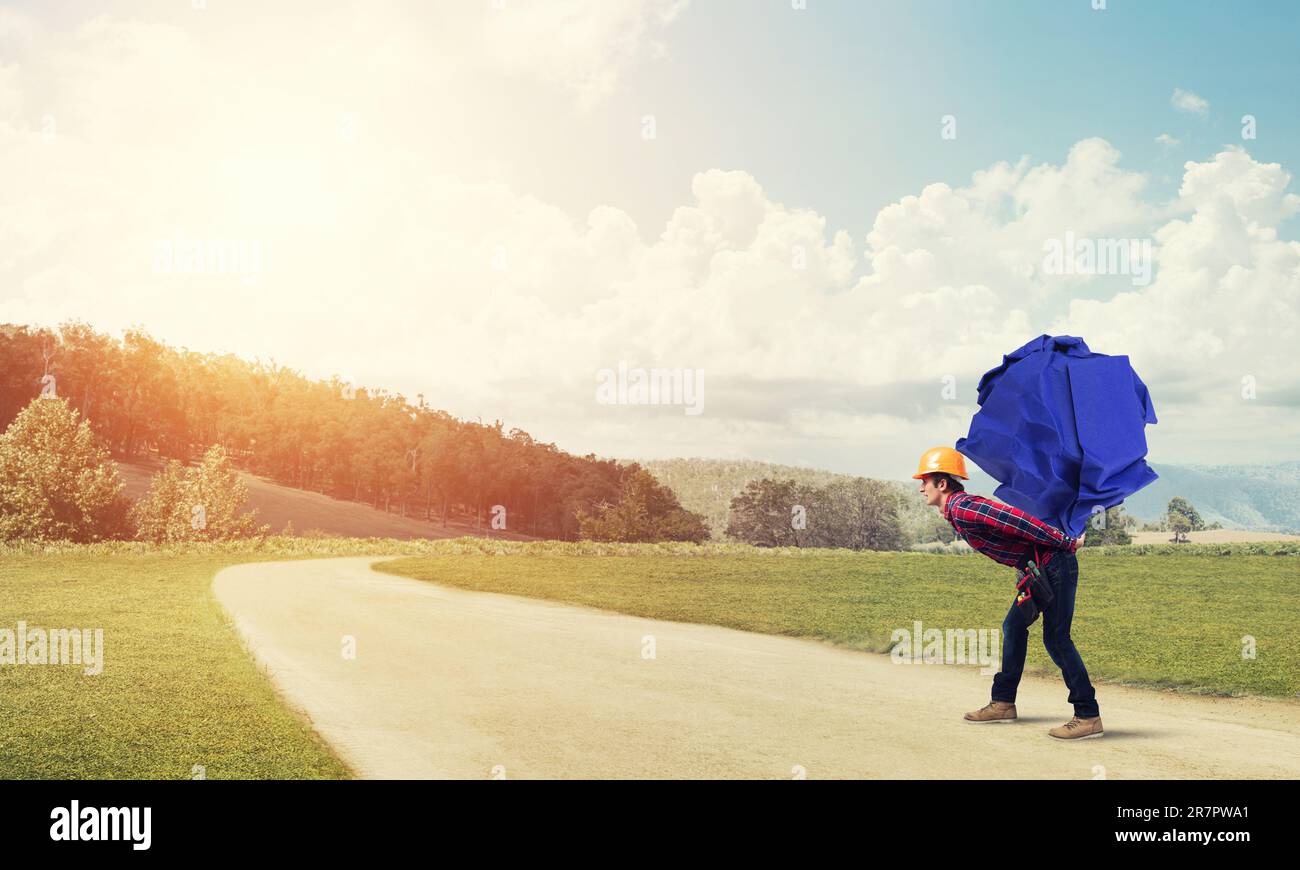 Engineer man carry load Stock Photo - Alamy