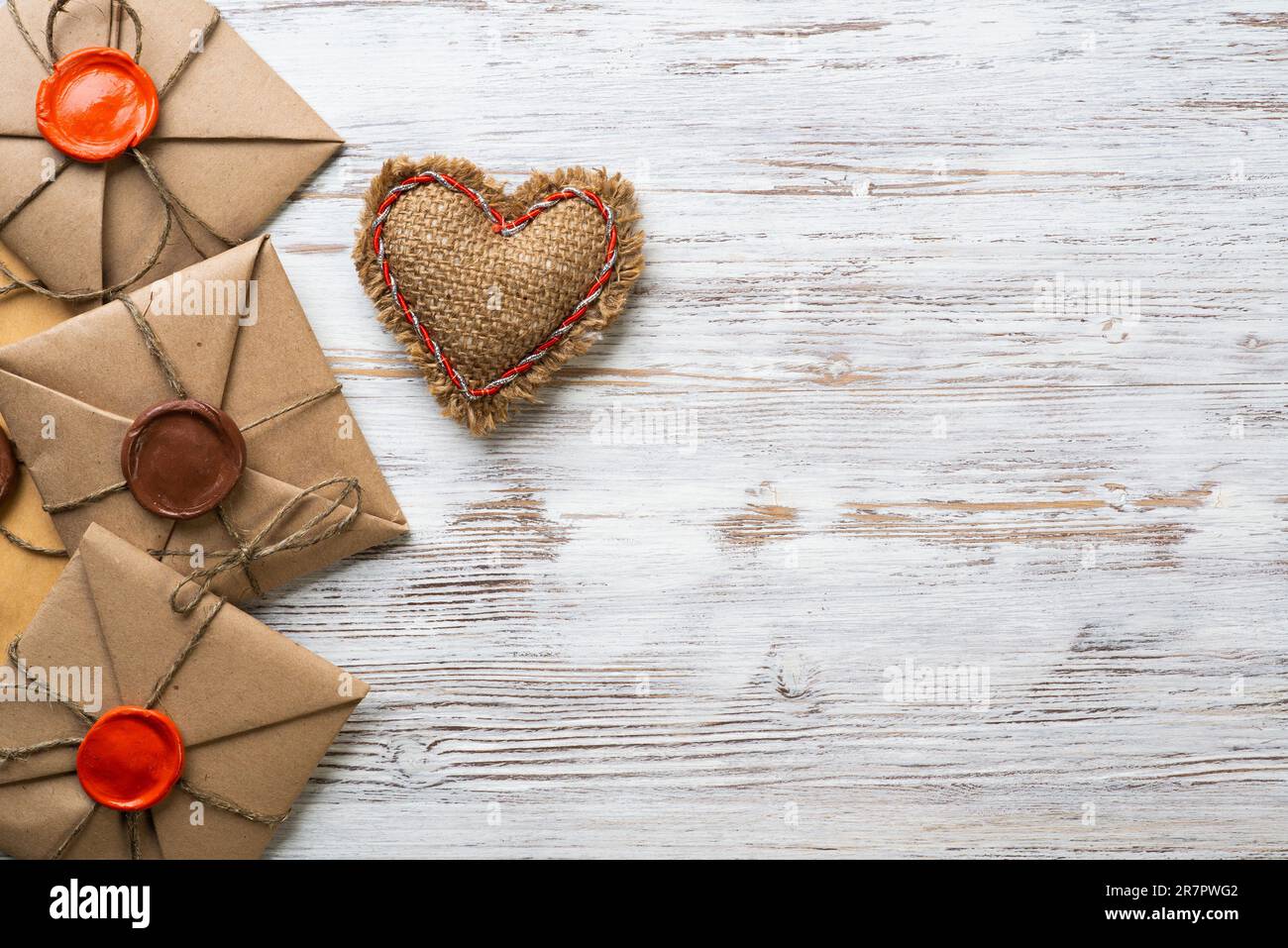 Flat lay cute composition with fabric heart Stock Photo - Alamy