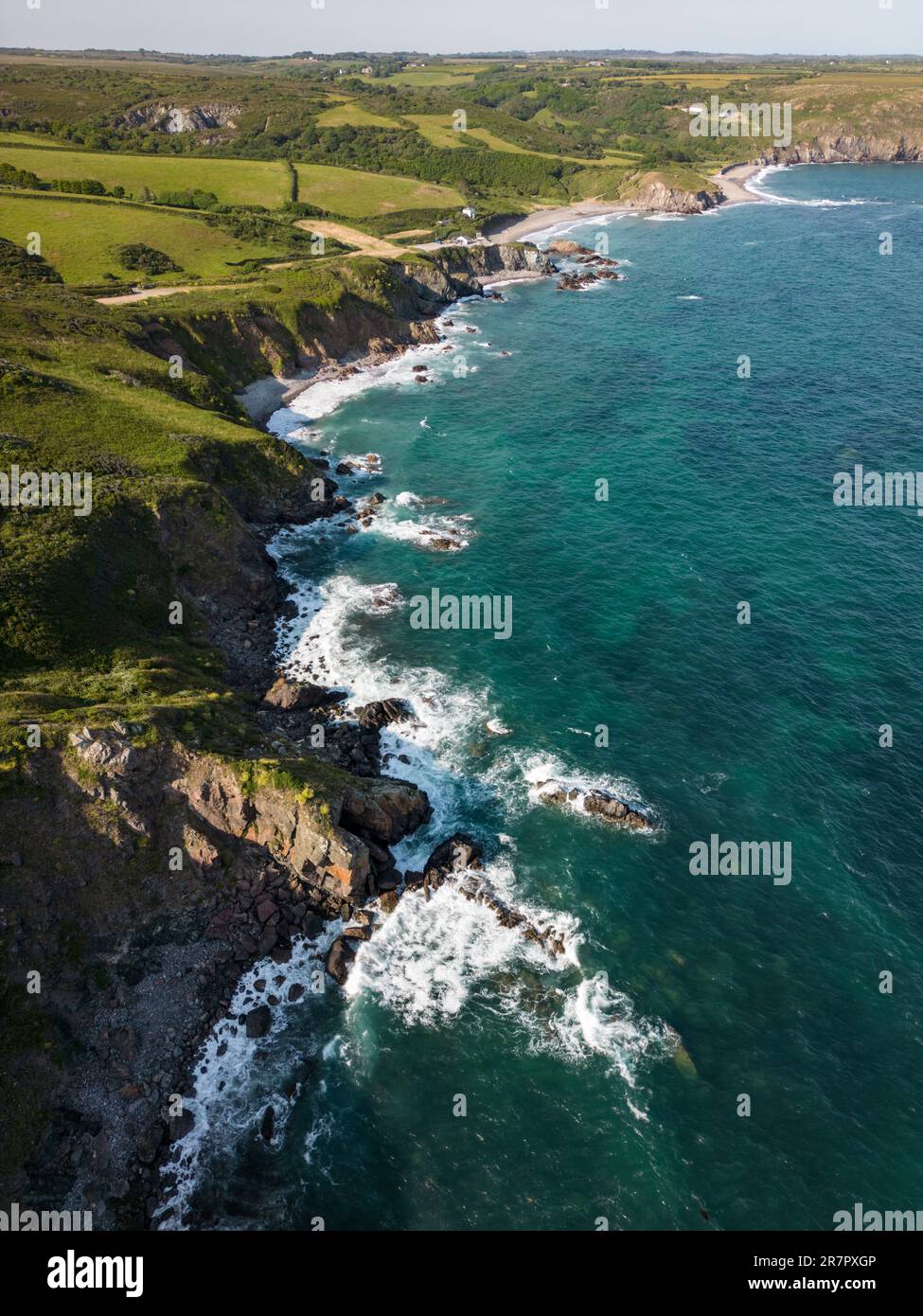 Aerial view of the rugged south Cornwall coastline near the village of ...