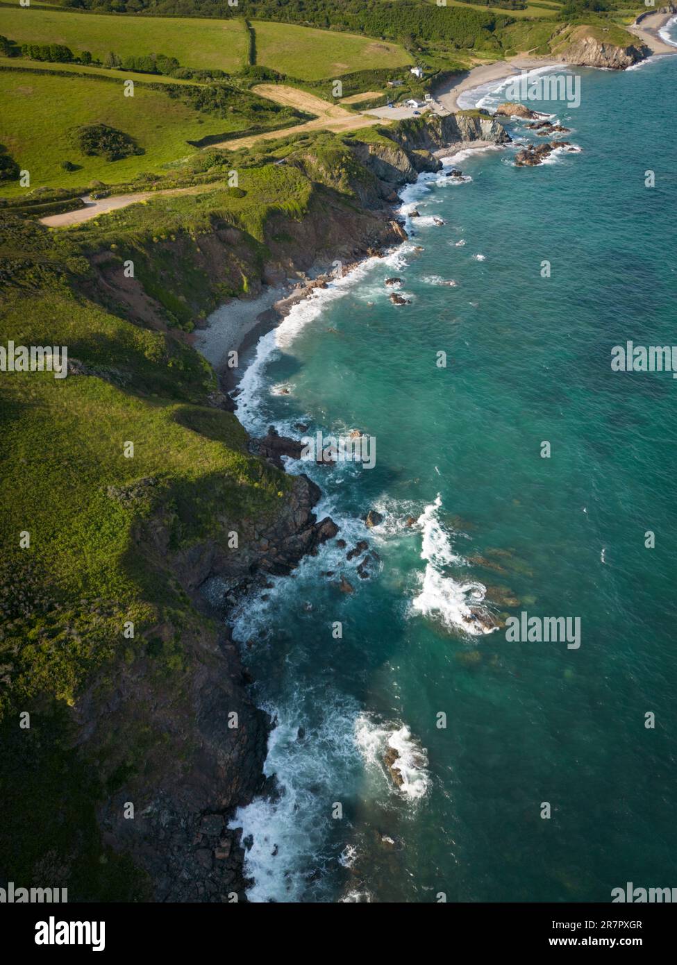 Aerial view of the rugged south Cornwall coastline near the village of ...