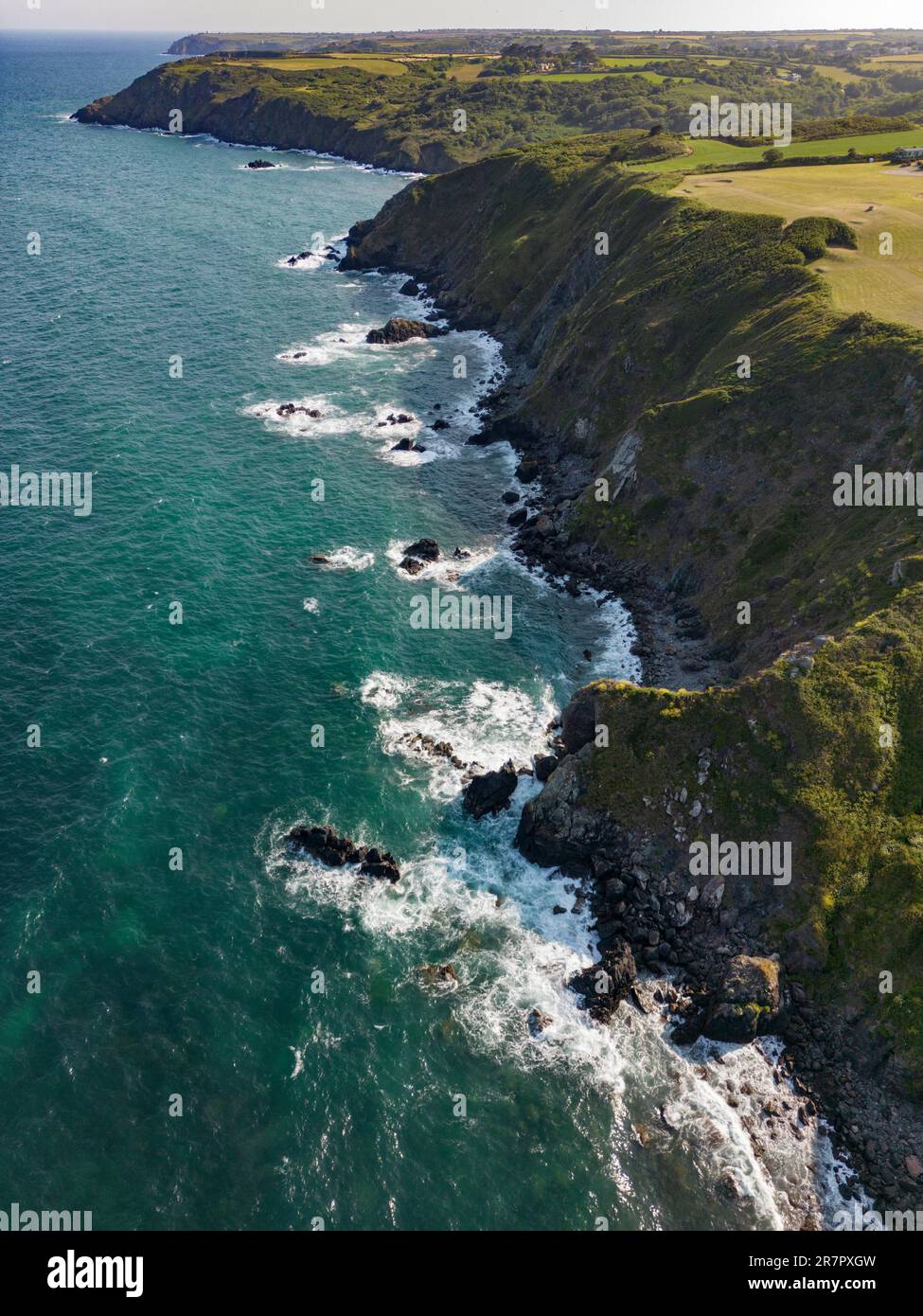 Aerial view of the rugged south Cornwall coastline near the village of ...