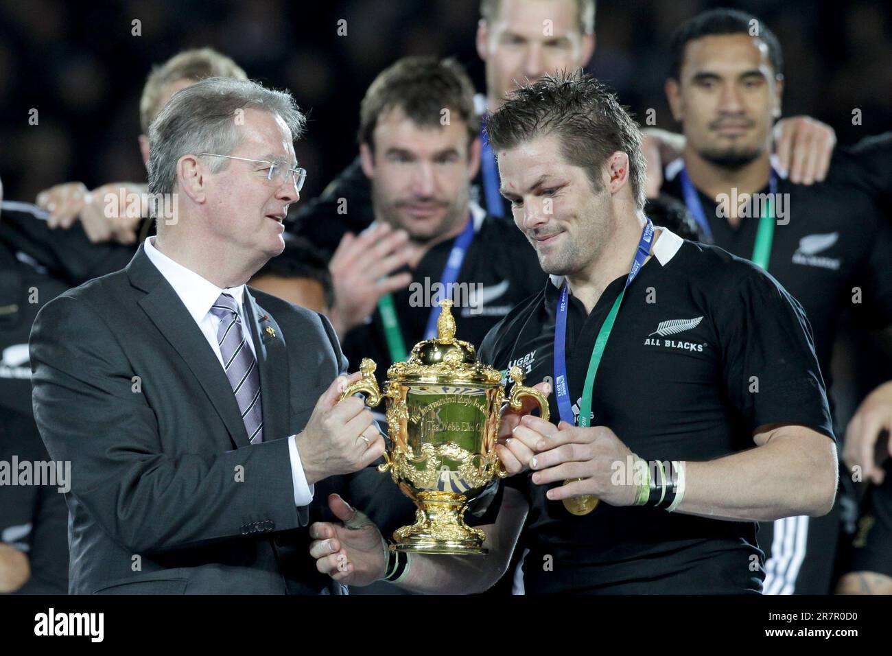 New Zealand’s captain Richie McCaw receives the cup from IRB Chairman ...