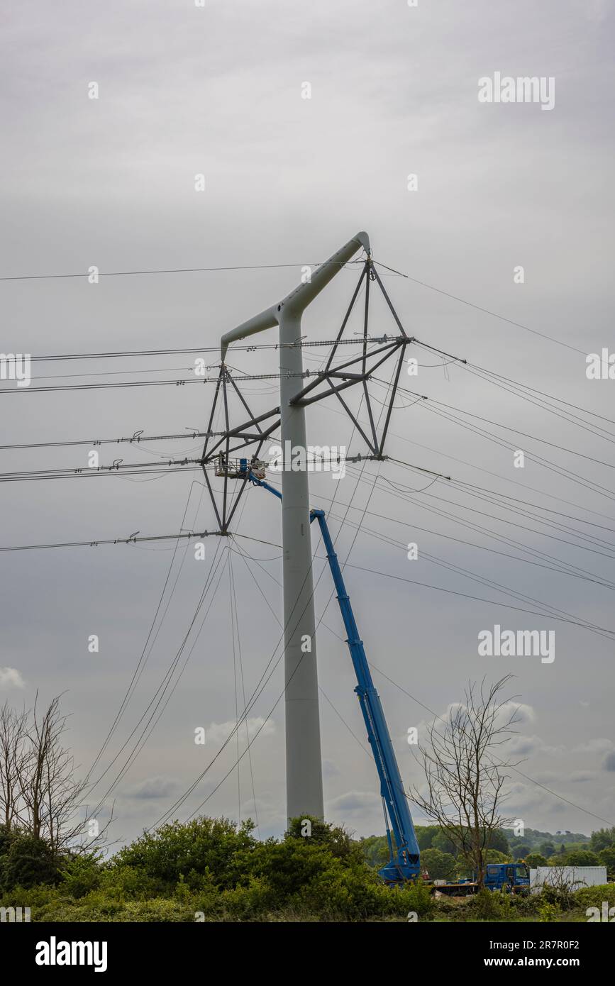 Pulling the power cables through snatch blocks Stock Photo - Alamy