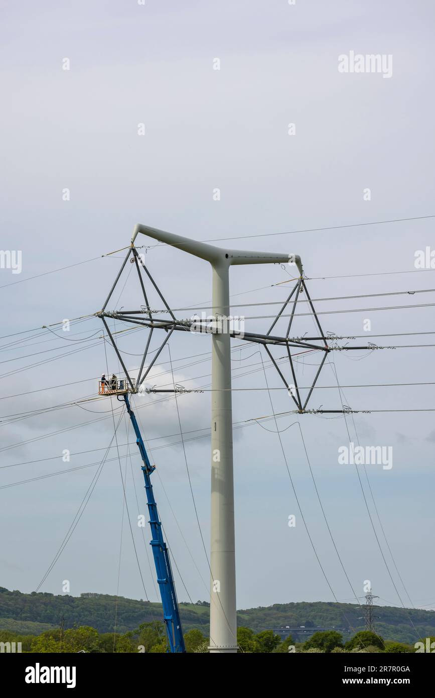 Pulling the power cables through snatch blocks Stock Photo - Alamy