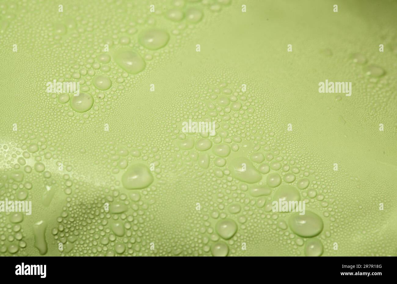 Macro background with water droplets condensation pattern on plastic ...